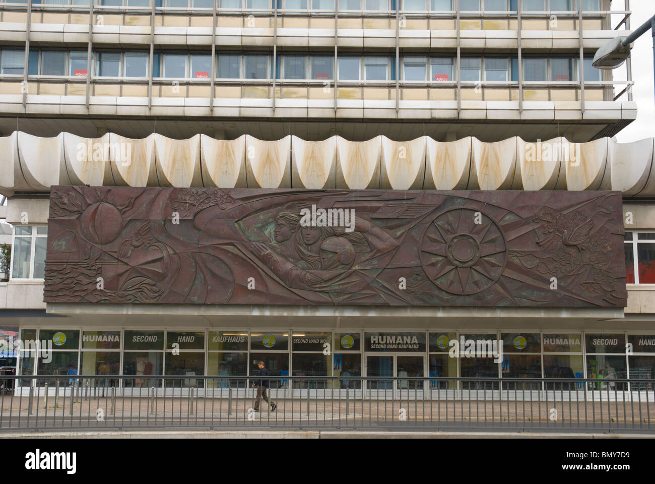 Socialist-era architecture and reliefs near Alexanderplatz east Berlin ...