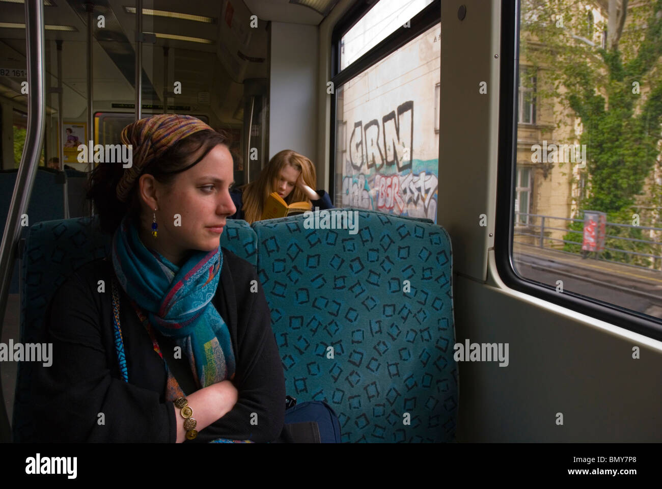 Women on S-bahn elevated train central Berlin Germany Europe Stock ...