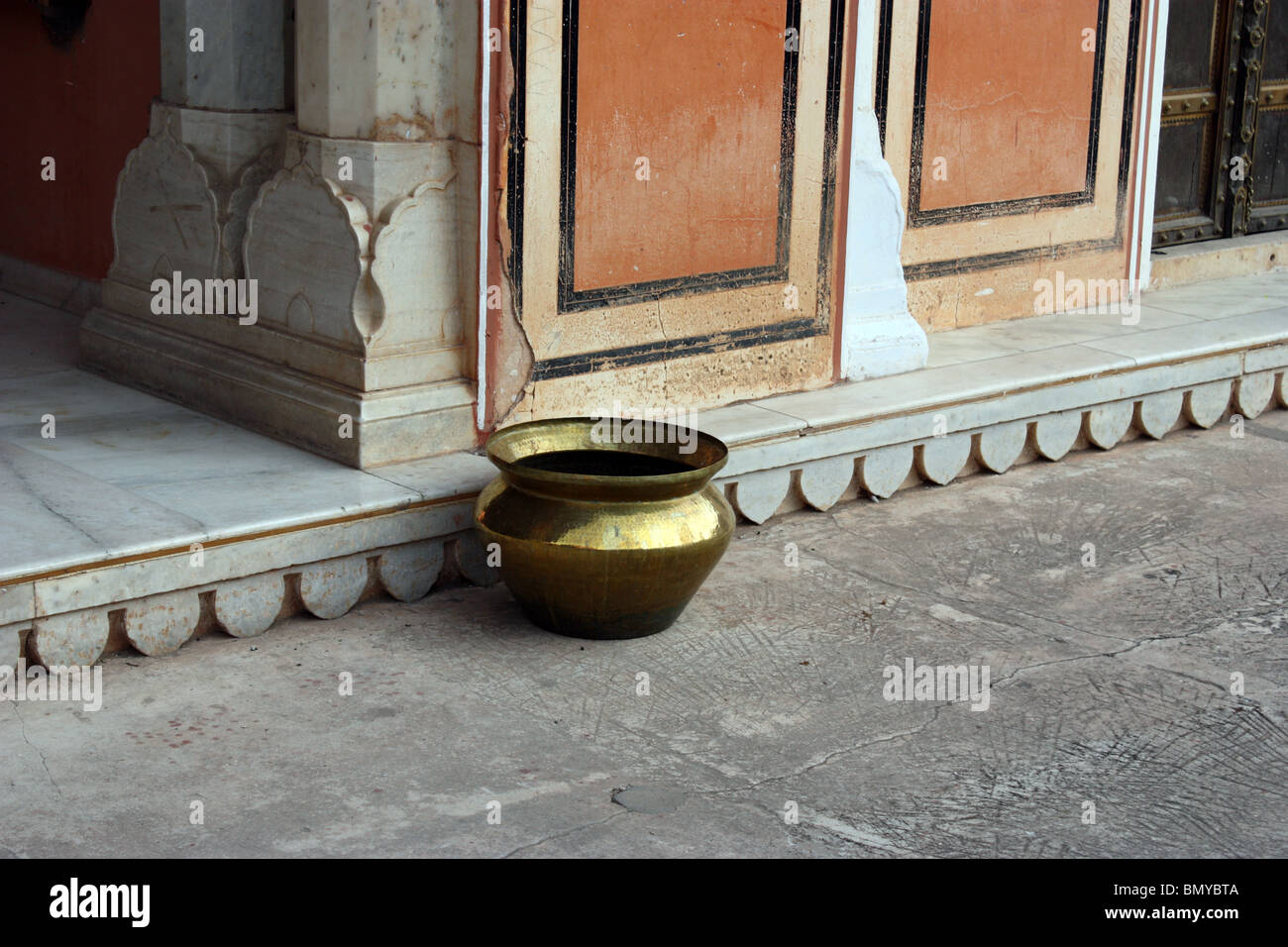 golden vessel on side of a verandah Stock Photo - Alamy