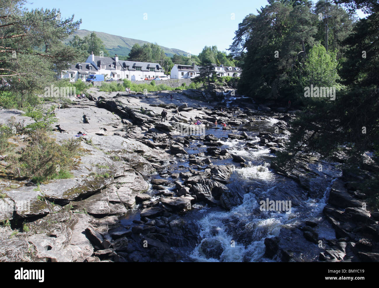 The Falls of Dochart and village of Killin Scotland June 2010 Stock ...
