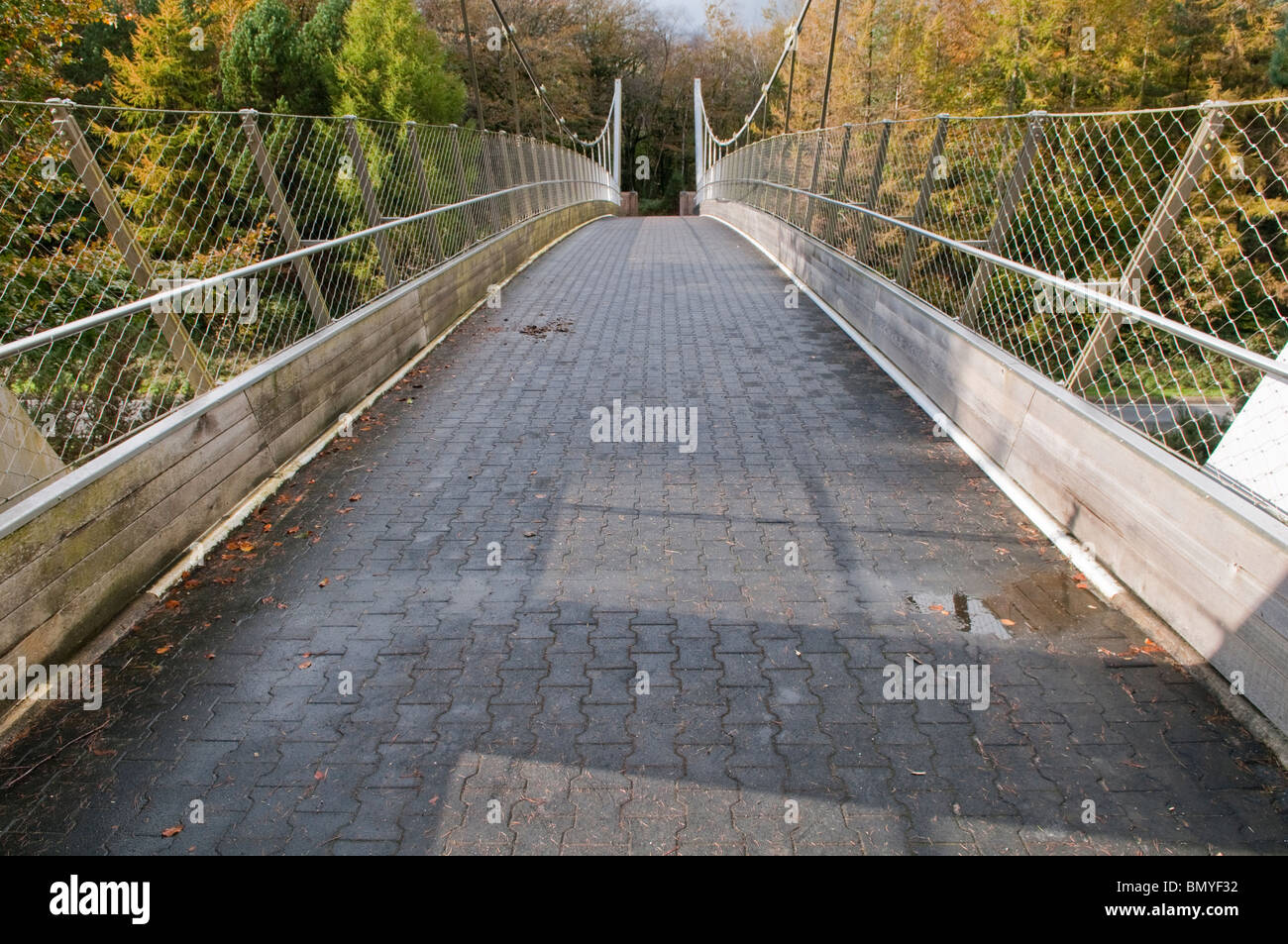Pedestrian suspension footbridge over the A30 near Bodmin, Cornwall ...
