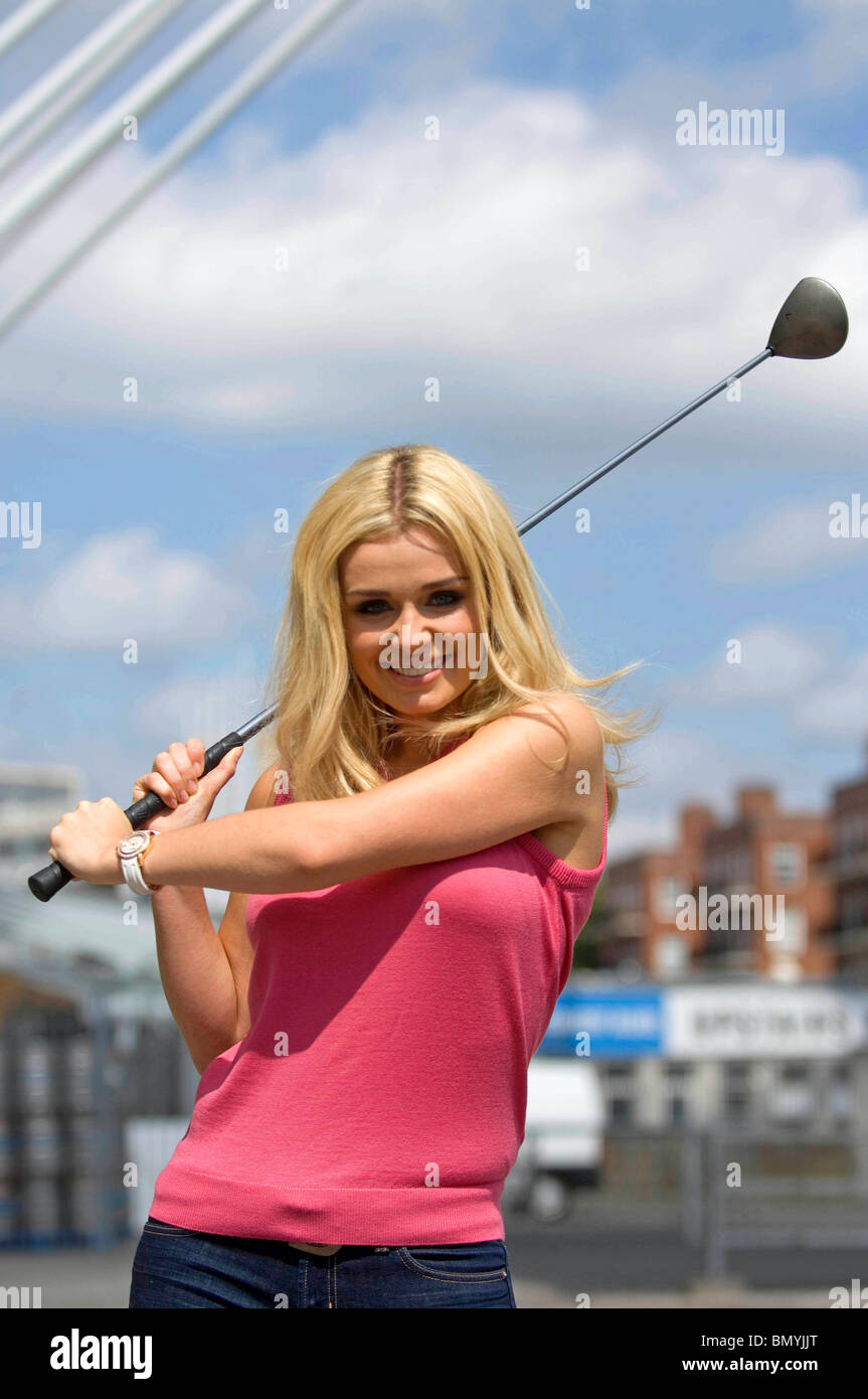 The Welsh singer Katherine Jenkins poses with a golf club outside the ...