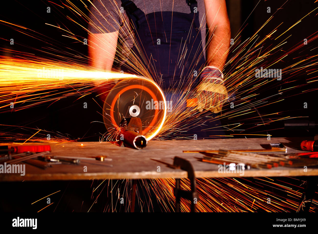 detail of electric grinder tool in action Stock Photo - Alamy