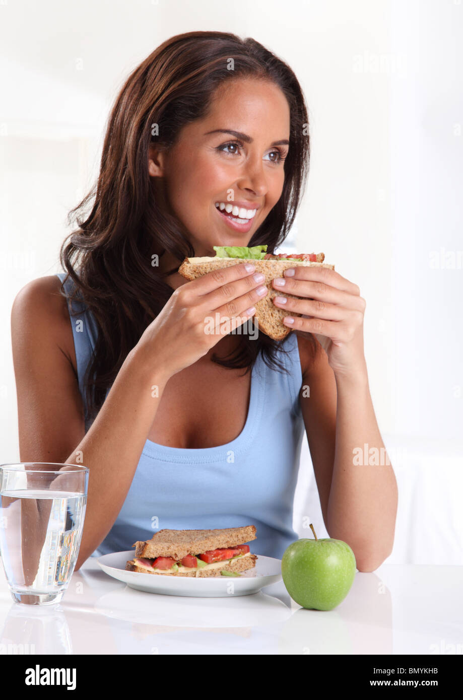WOMAN EATING LUNCH Stock Photo - Alamy