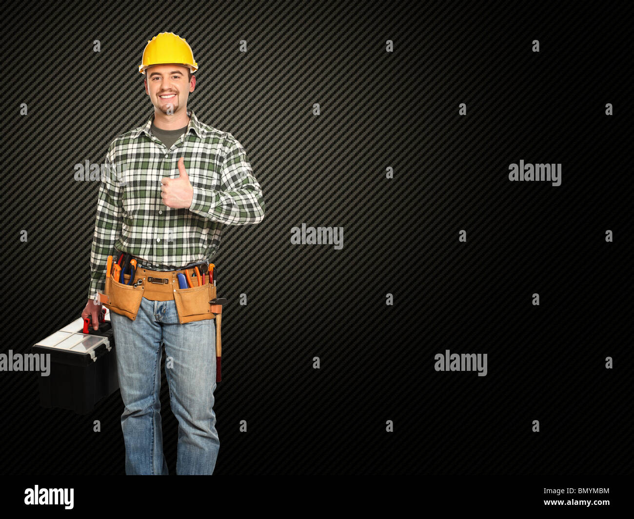 positive handyman and carbon background Stock Photo - Alamy