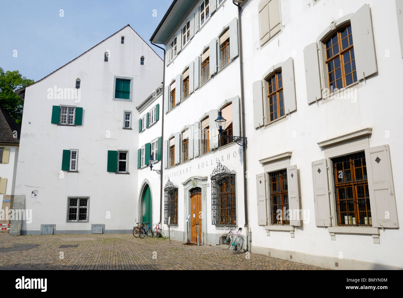Traditional Swiss buildings in Münsterplatz, Basel, Switzerland Stock ...