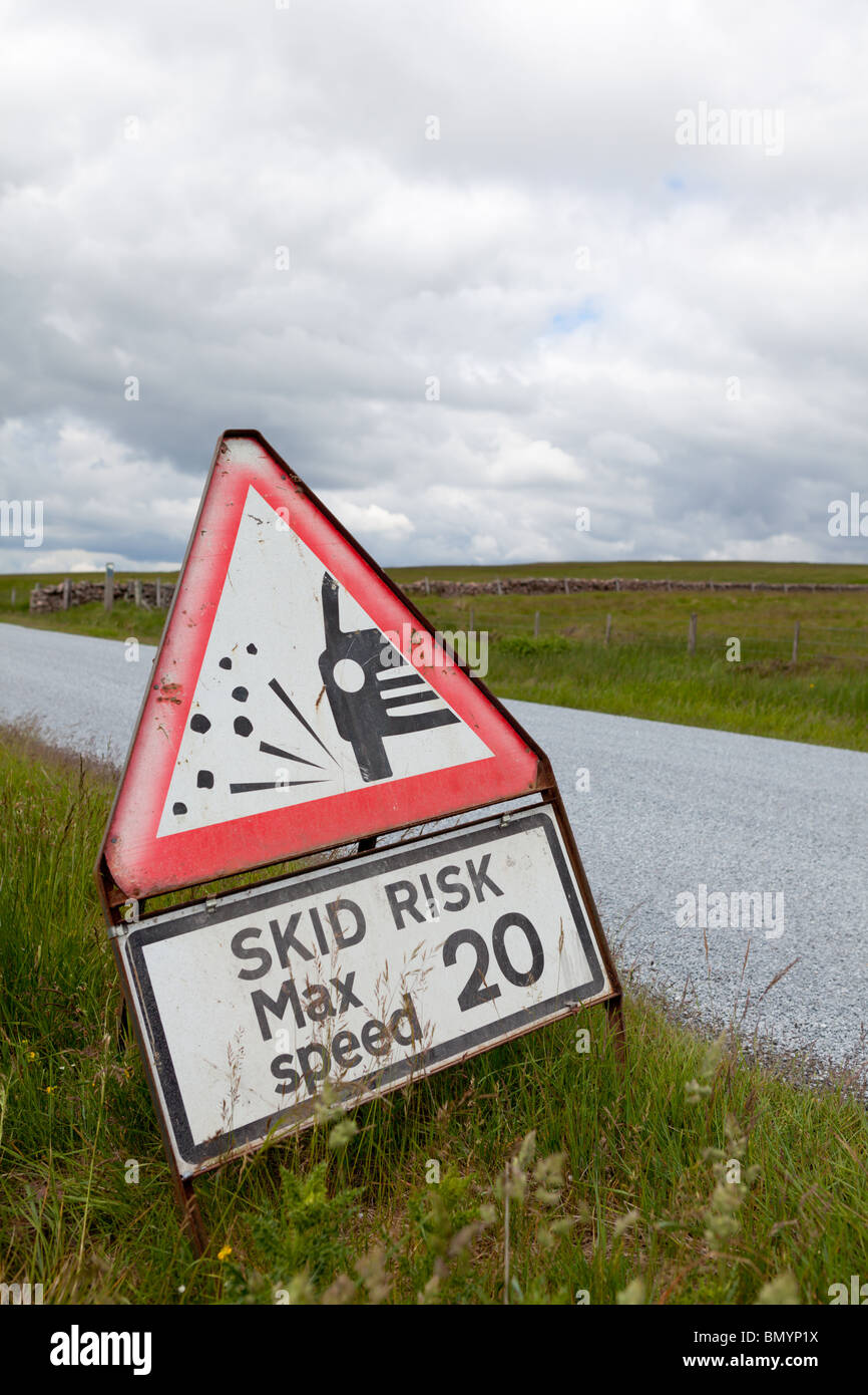 Skid Risk sign on a newly resurfaced road in the Scottish Borders Stock ...