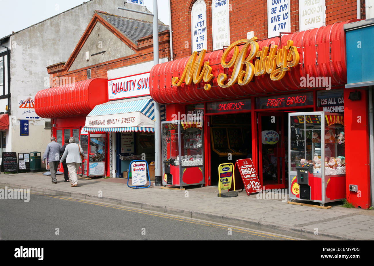 Typical mix of shops and amusement arcades in the main street of the ...