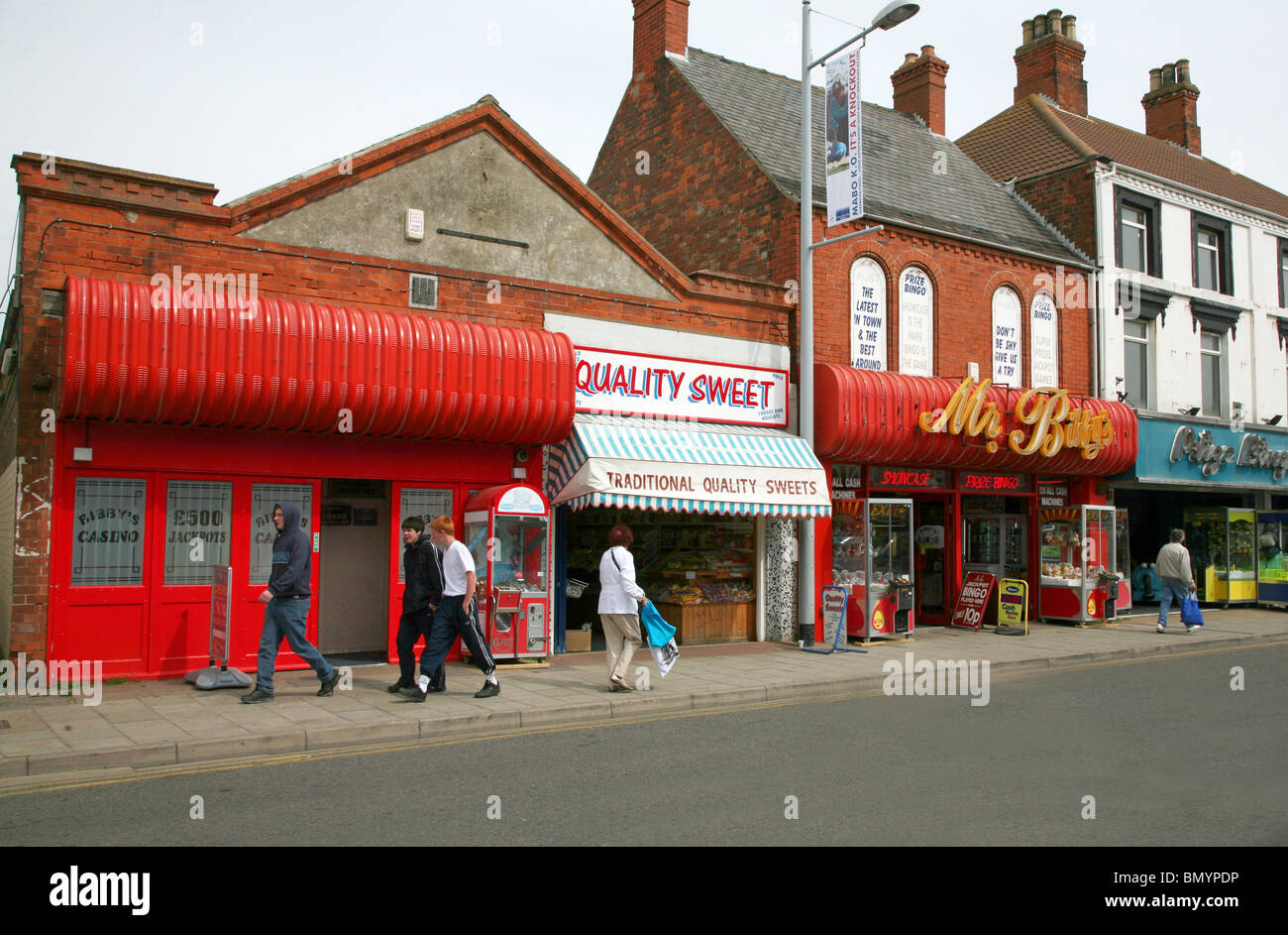 Typical mix of shops and amusement arcades in the main street of the ...