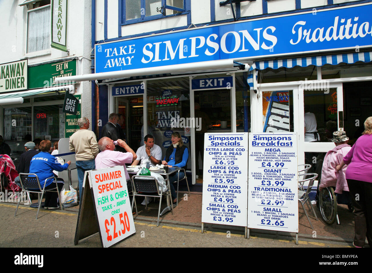 Typical mix of shops, cafes and take-aways along the High Street in the ...