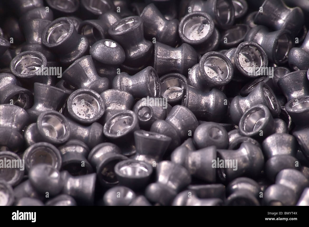 Pile of lead air gun pellets closeup view Stock Photo - Alamy