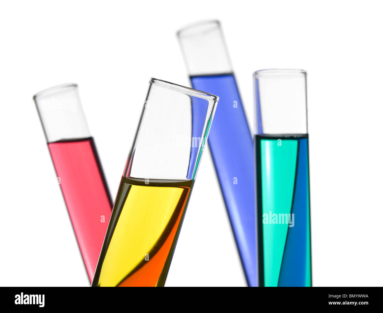 Four test tubes filled with colored liquids. Isolated on white Stock ...