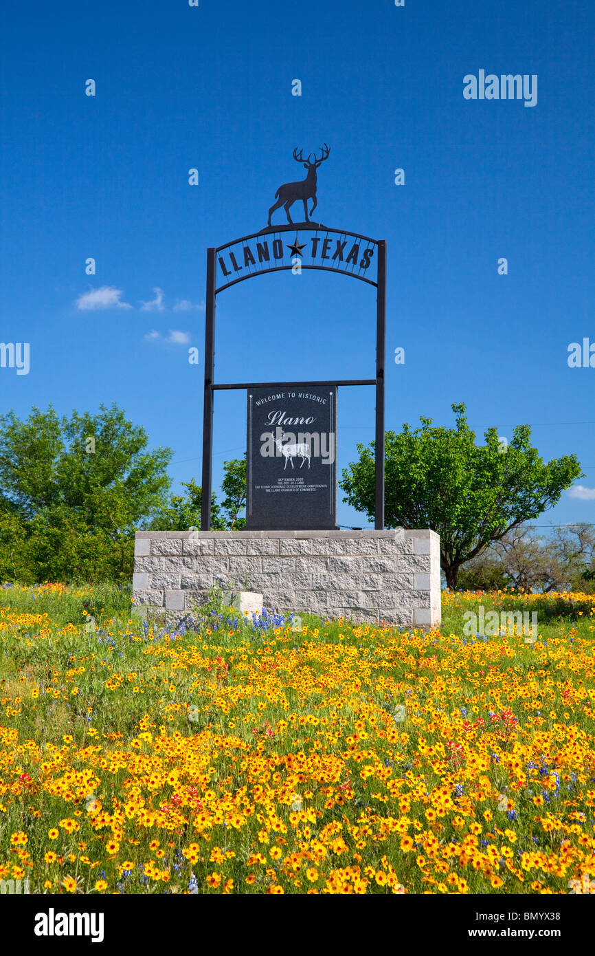 A modern sign and wildflowers for the city of Llano, Texas, USA Stock ...