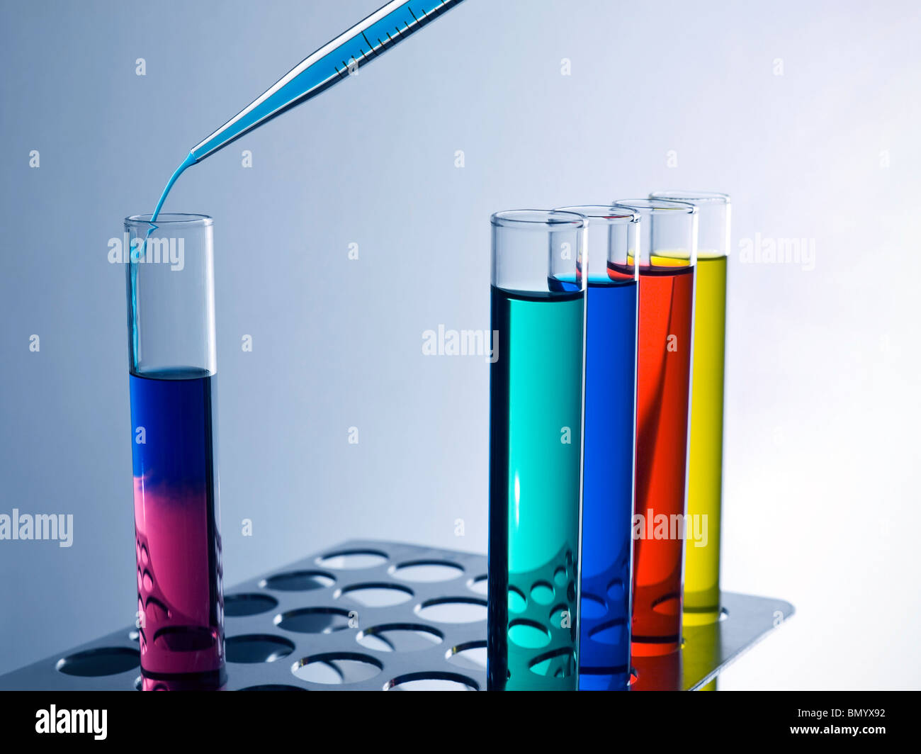 Close up of test tubes filled with color liquids and a pipette Stock ...