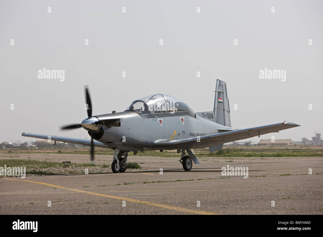 An Iraqi Air Force T-6 Texan trainer aircraft taxis out for a flight ...