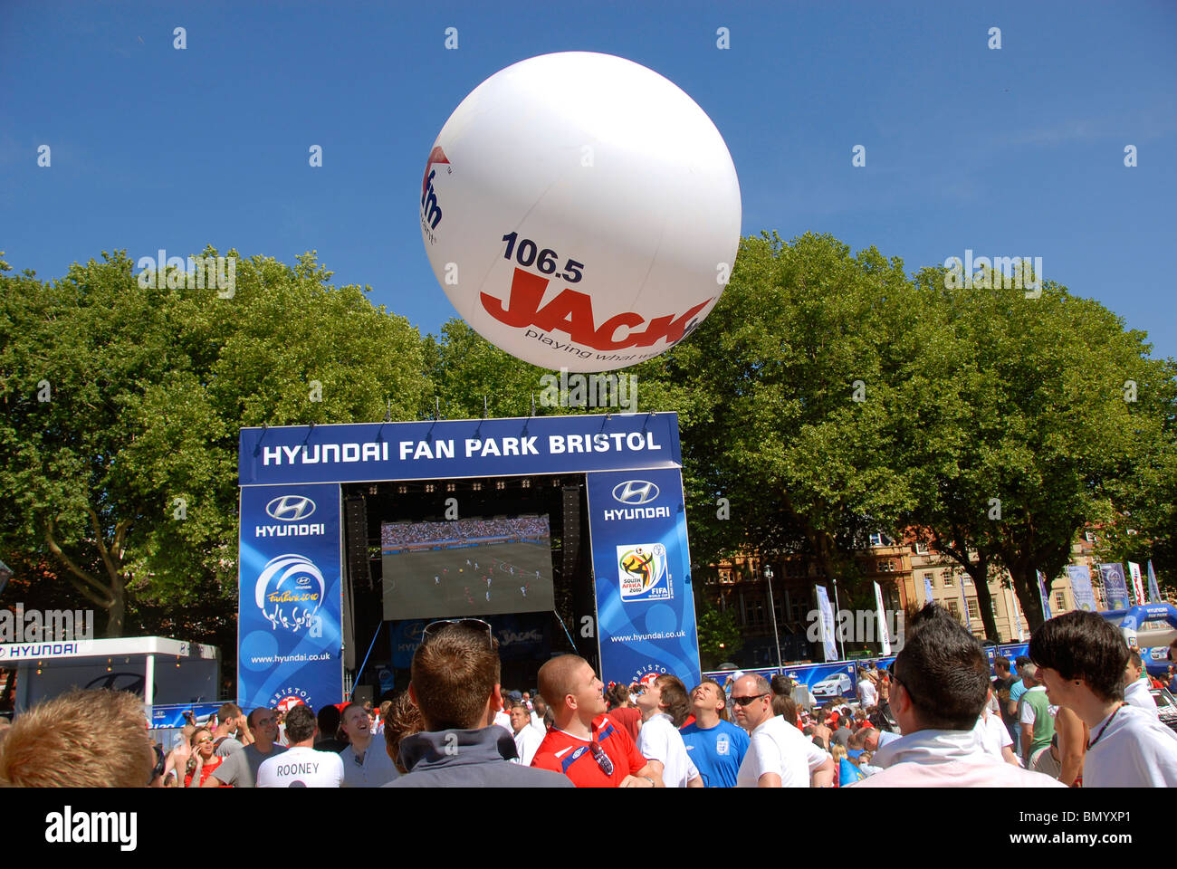 People playing with giant promo ball, World Cup, Fan Park Bristol, UK ...