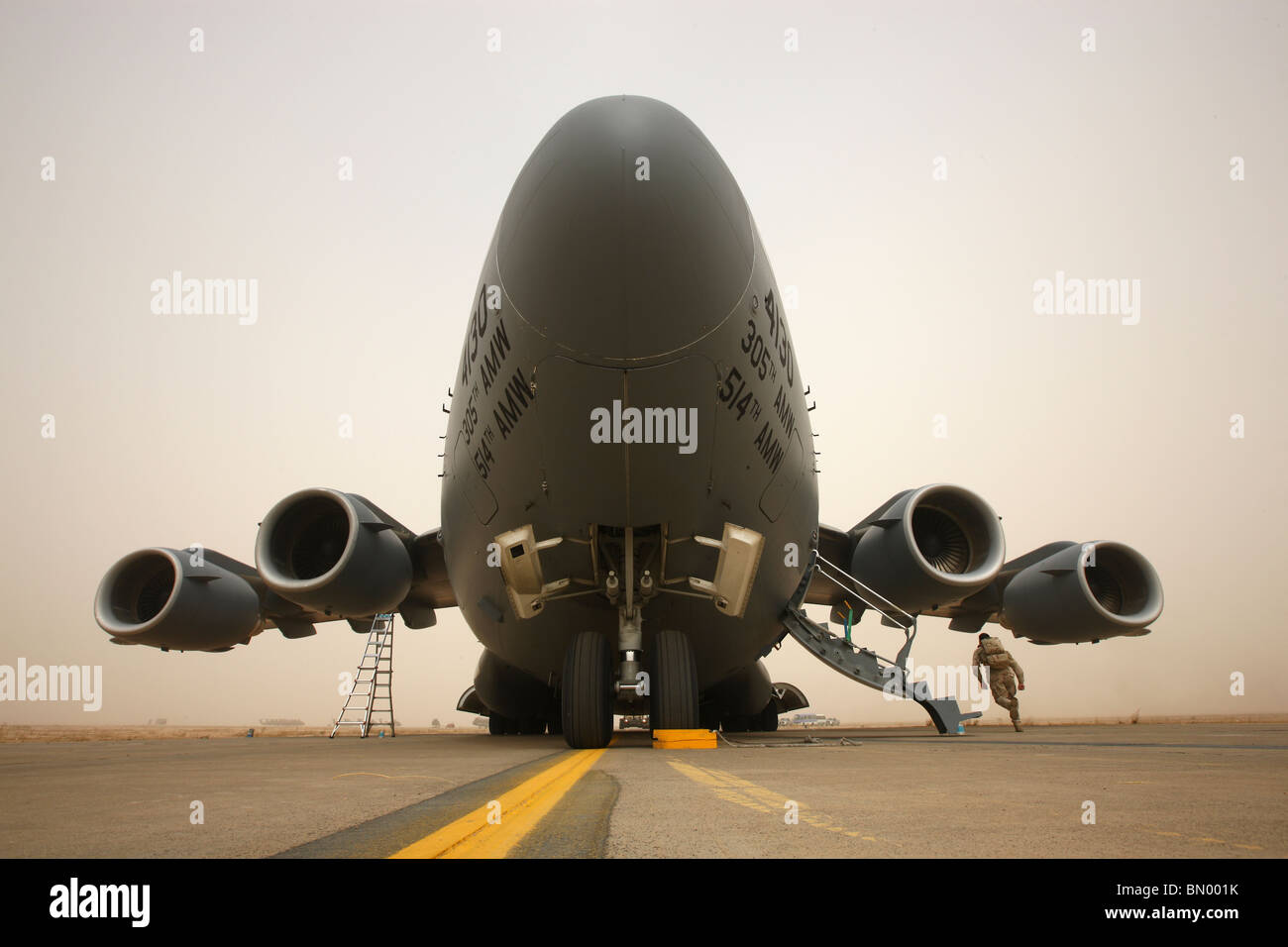 A C-17 Globemaster III sits on the runway at COB Speicher, Iraq Stock ...