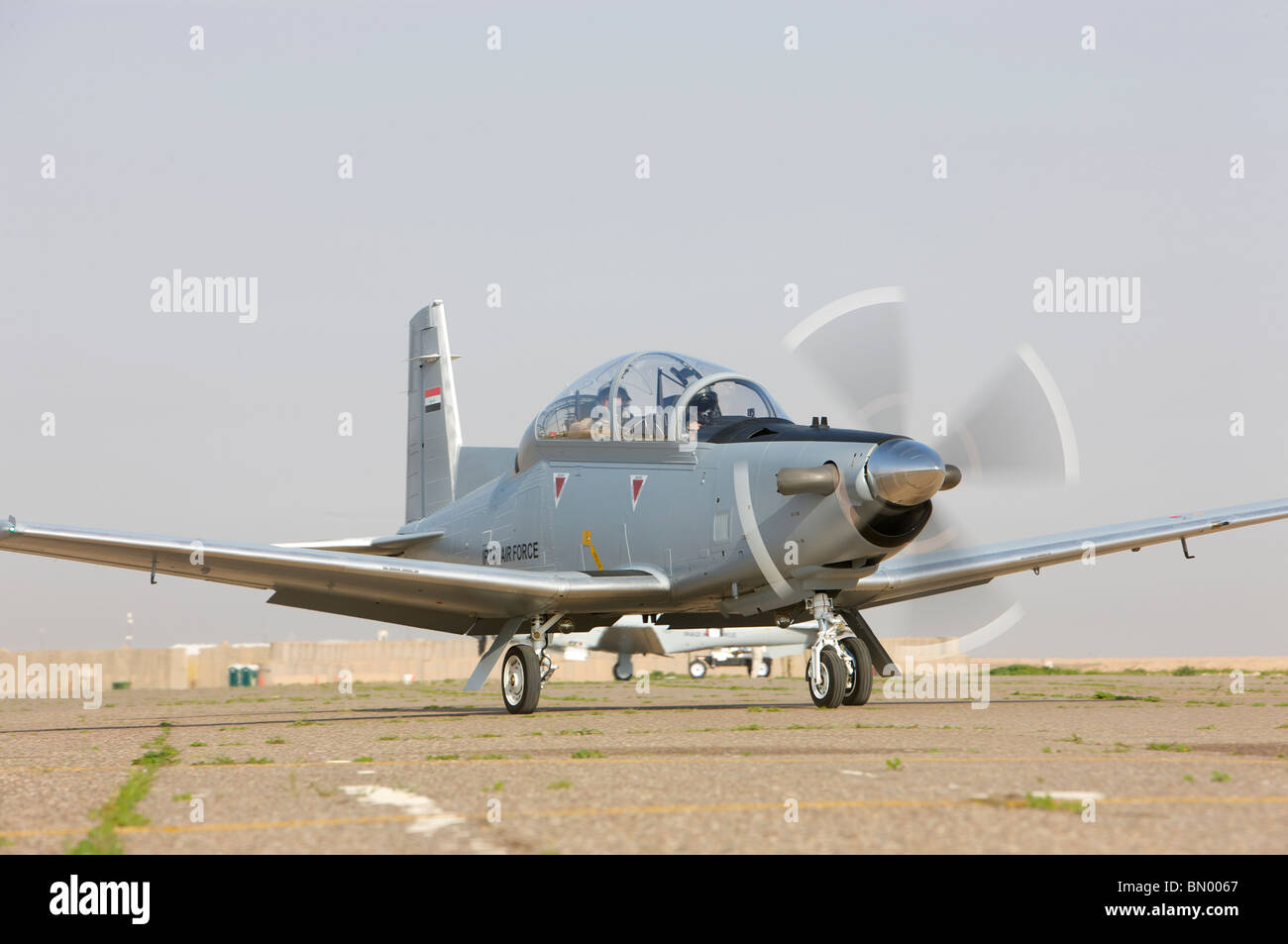 Pilots perform a pre-flight test on their T-6 Texan trainer aircraft ...