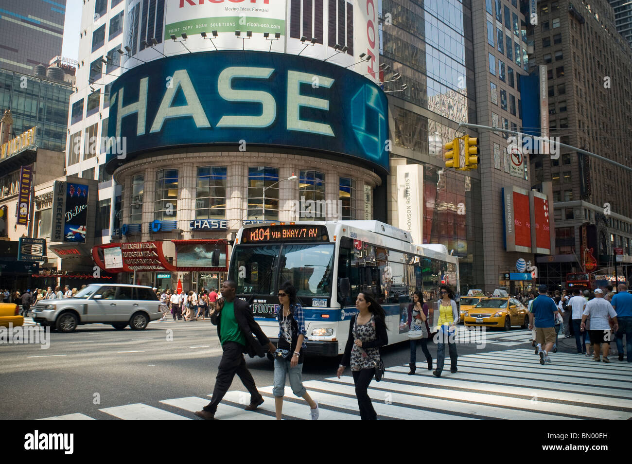 A bus turns onto West 42nd Street in Times Square on Friday, June 18 ...