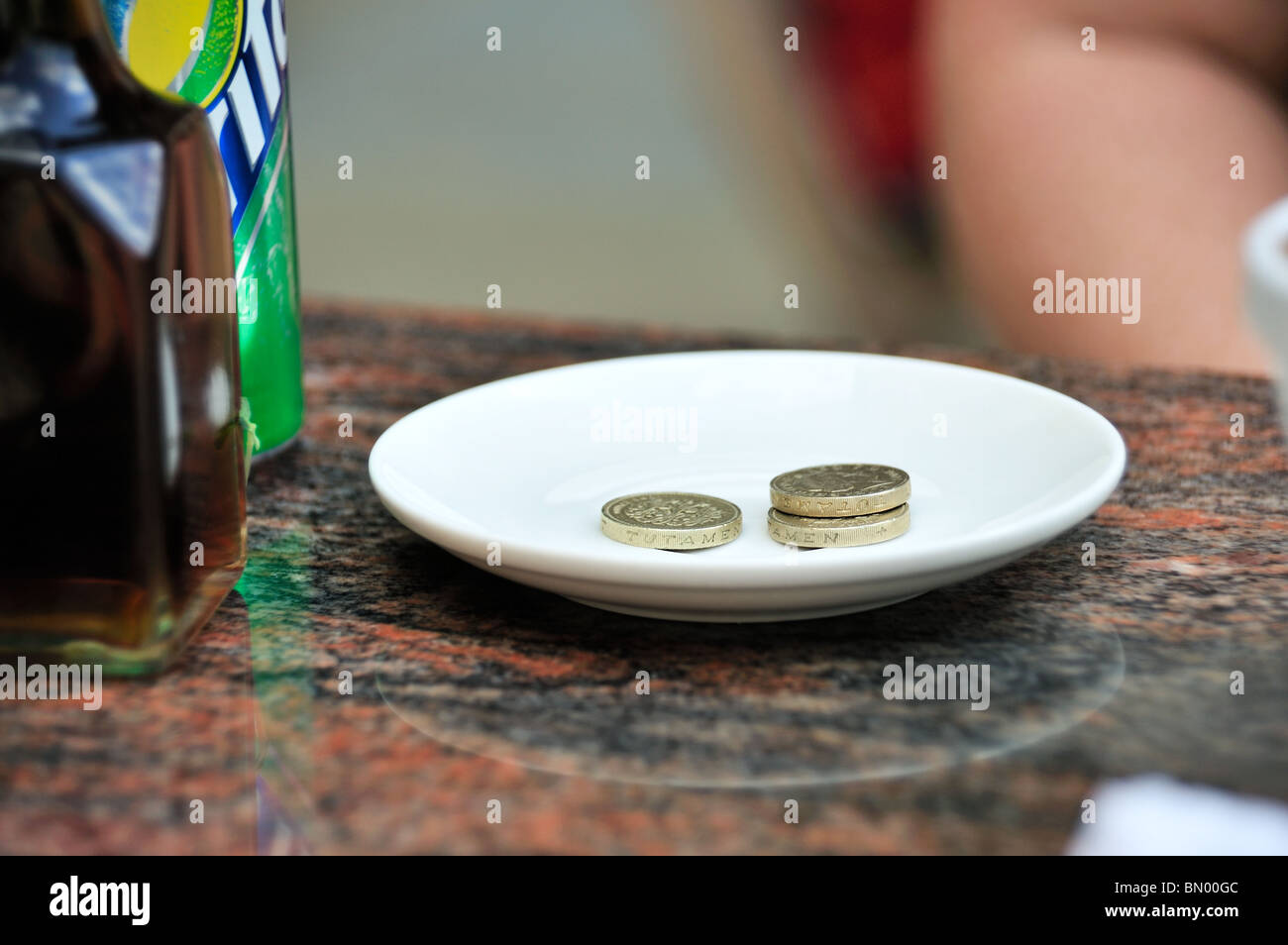 Waiter tip on table hi-res stock photography and images - Alamy