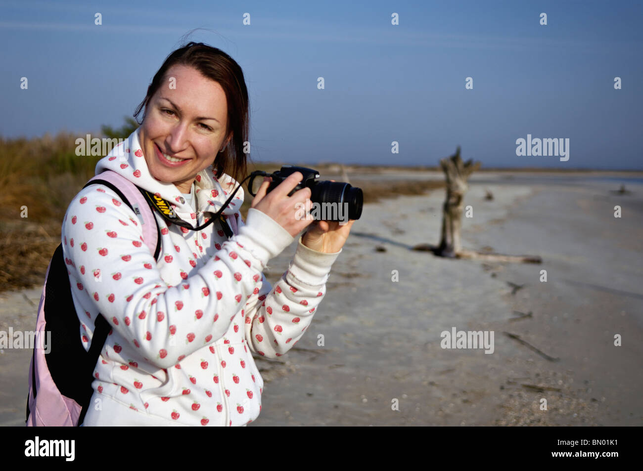 Young Woman Posing with Camera at Folly Beach in Charleston County ...
