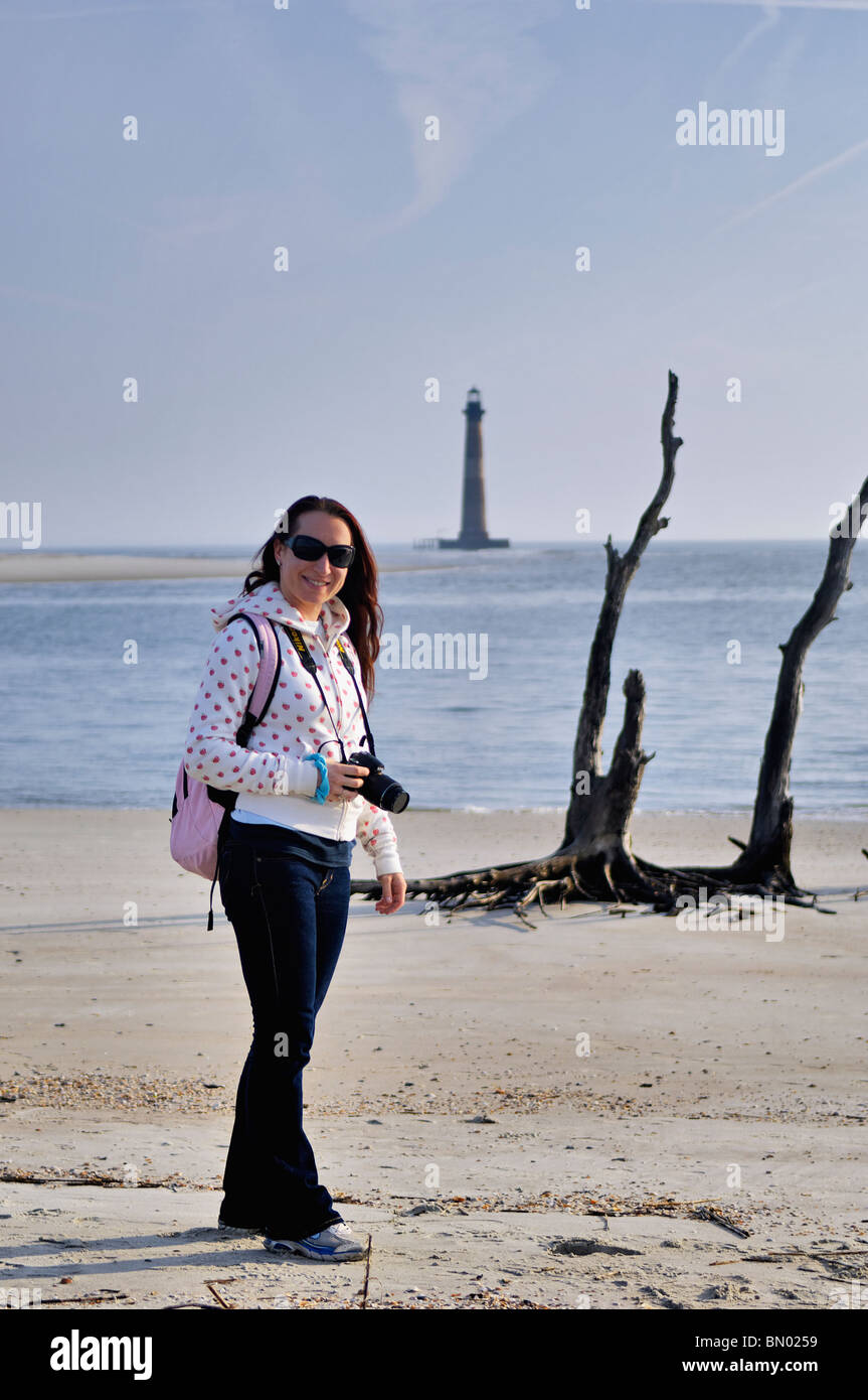 Young Woman with Camera at Folly Beach in Charleston County, South ...