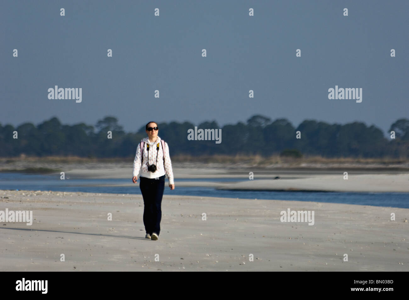 Woman Walking On Folly Beach in Charleston County, South Carolina Stock ...