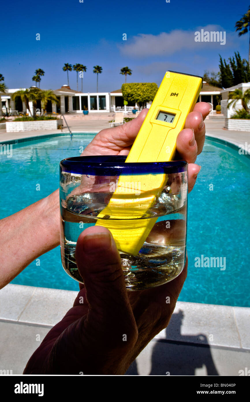 A digital pH meter is used to check the acidity or alkalinity of a ...