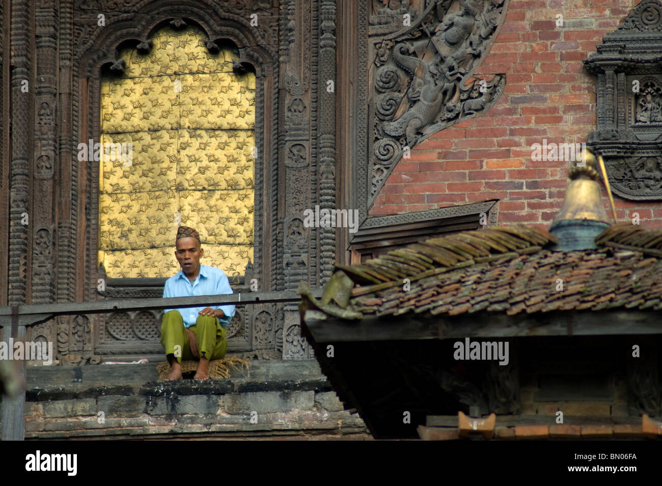 An old man rests outside the Taleju Temple, Durbar Square, Kathmandu ...