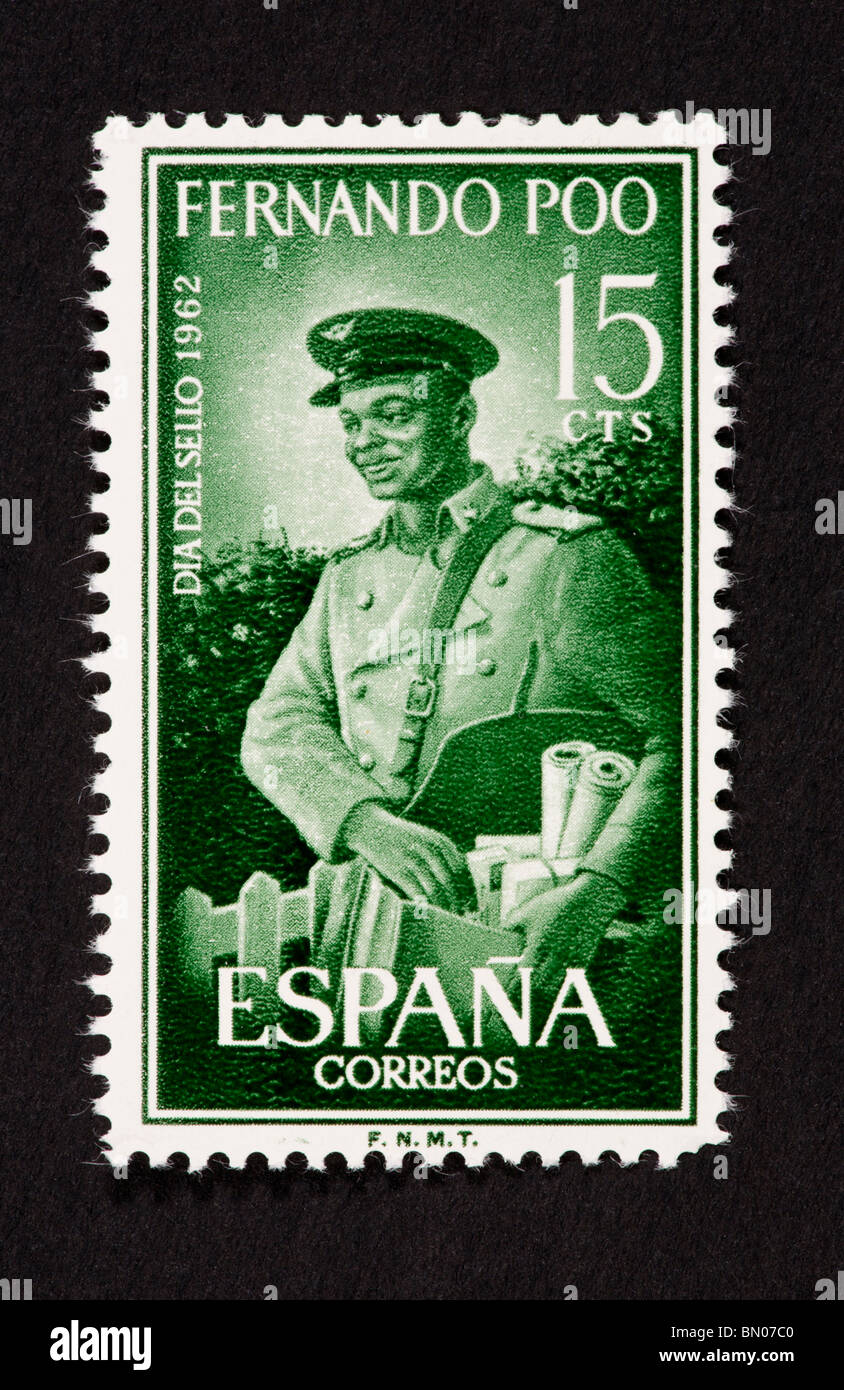 Postage stamp from Fernando Po depicting a mailman Stock Photo - Alamy