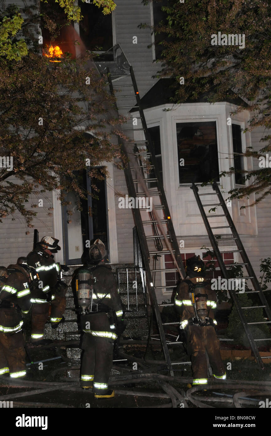 Firefighters with ladder hi-res stock photography and images - Alamy