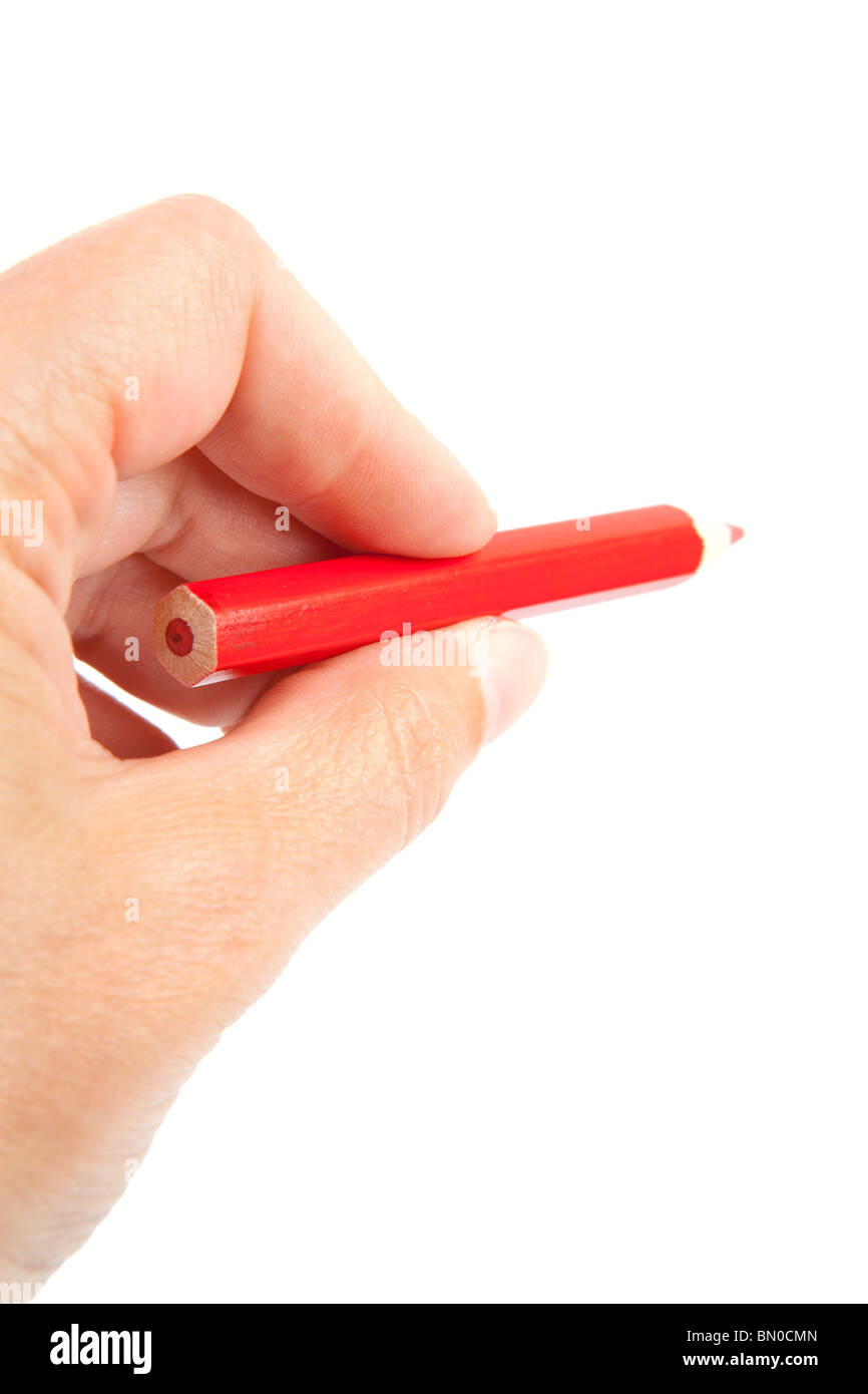hand is holding red pencil and writes over white background Stock Photo ...