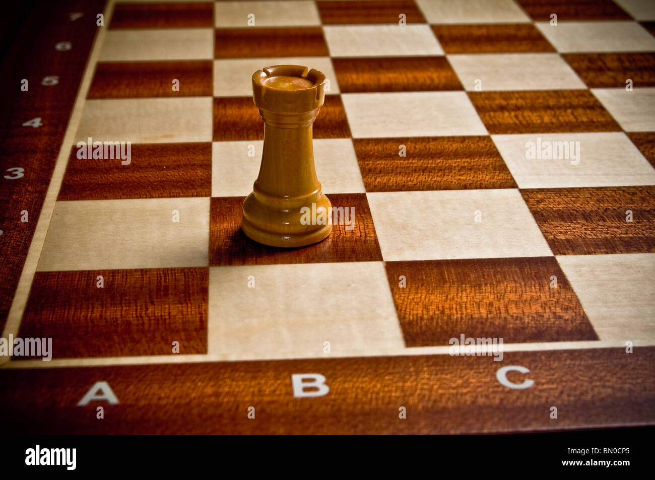 chess piece of Rook on a chessboard Stock Photo - Alamy