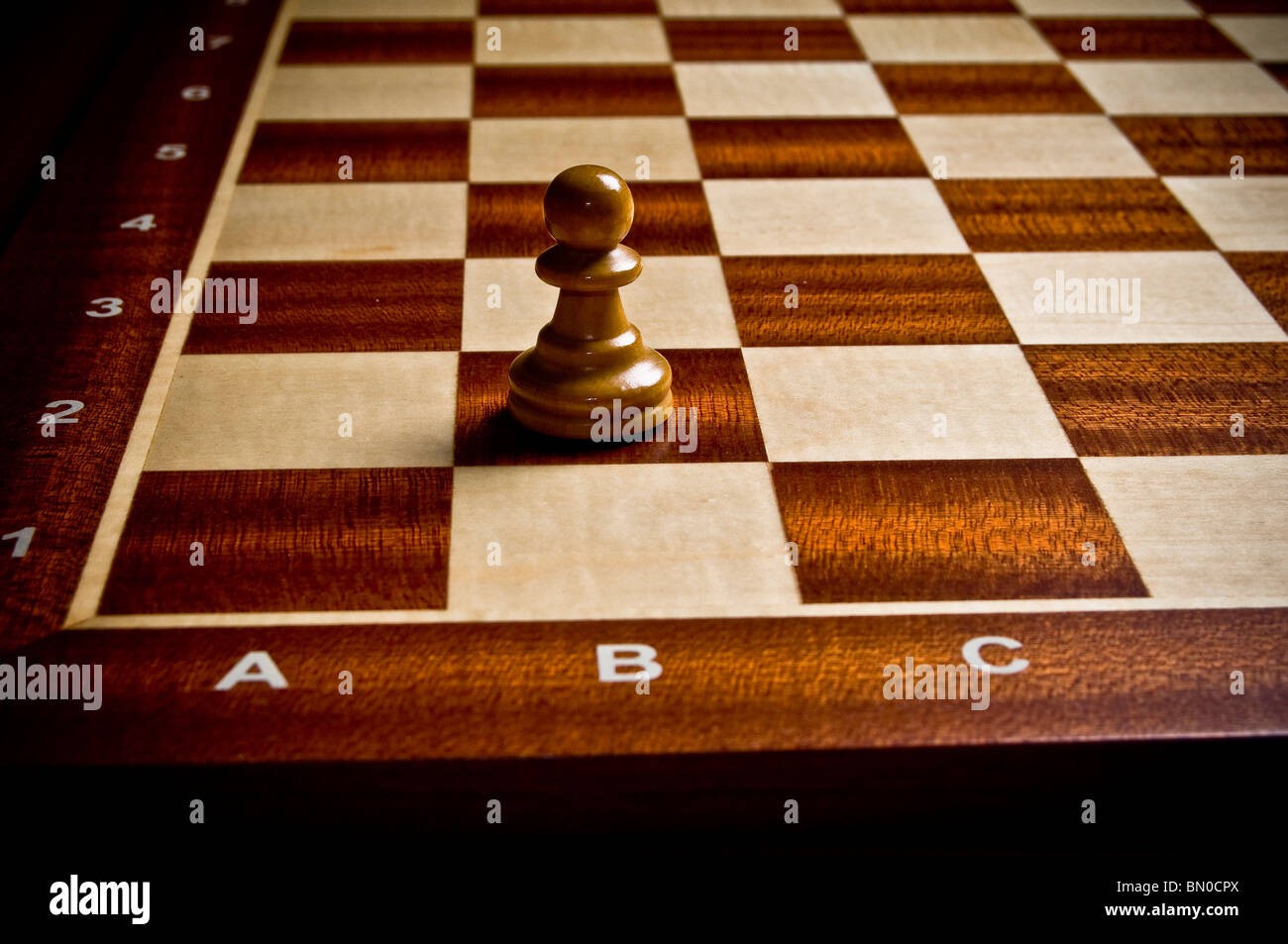 chess piece of Pawn on a chessboard Stock Photo - Alamy