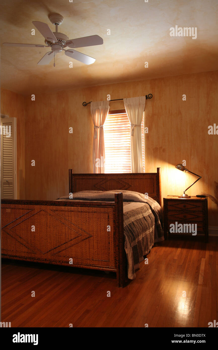 Bedroom with Rattan Bed Stock Photo - Alamy