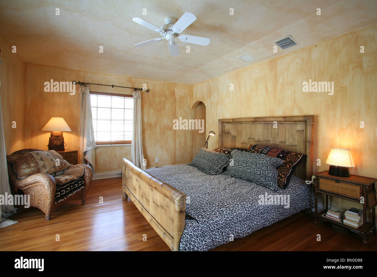 Bedroom with Rattan Bed Stock Photo - Alamy