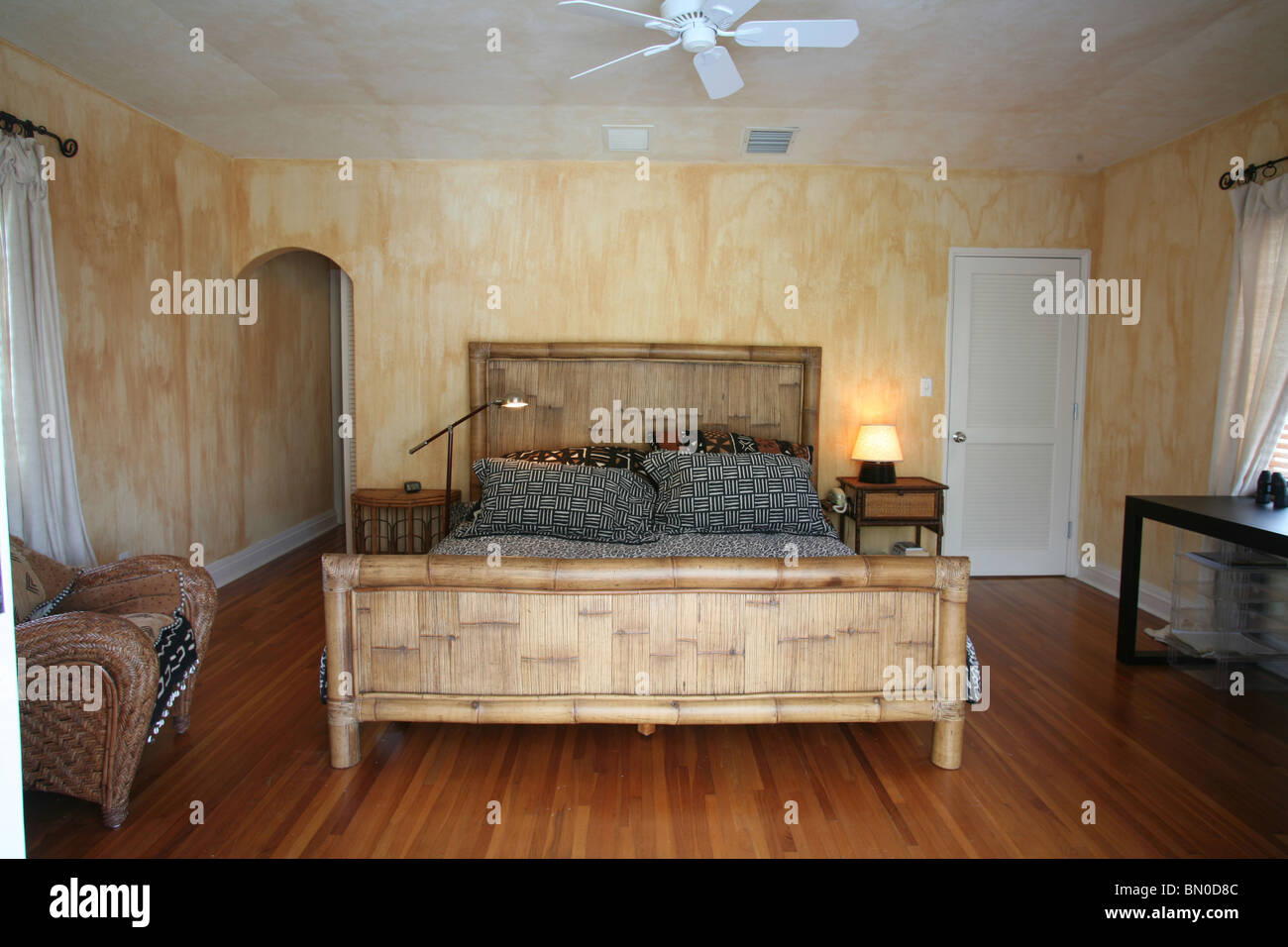 Bedroom with Rattan Bed Stock Photo - Alamy