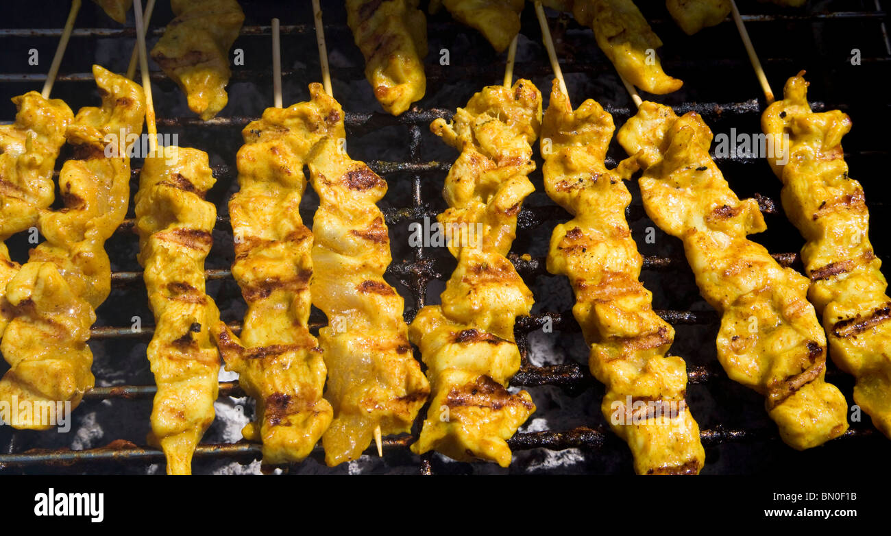 BBQ chicken satay on skewers Stock Photo - Alamy