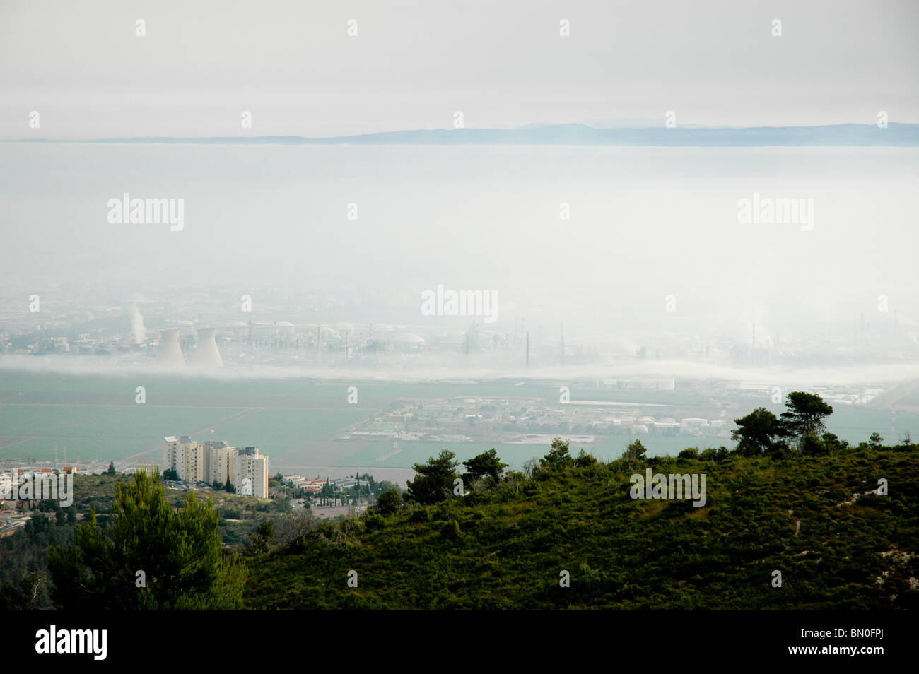 Israel, Haifa Bay Industrial area. Air Pollution the Inversion layer is ...