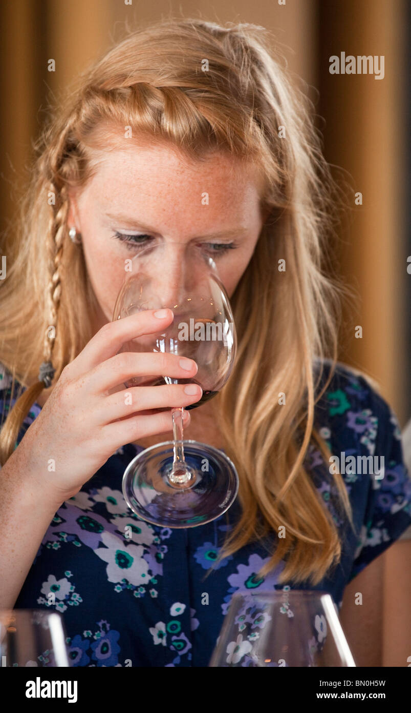 Canada,Ontario,Niagara-on-the-Lake, woman wine tasting at winery Stock ...