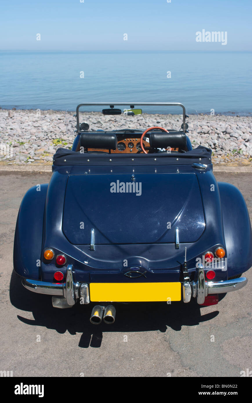 open top sports car at the seaside Stock Photo - Alamy