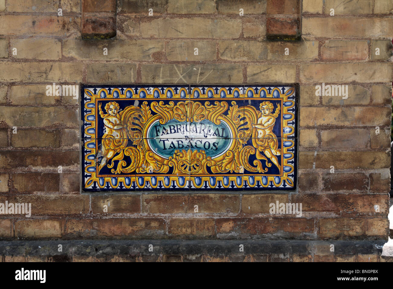 Old azulejo sign for the Fabrica Real de Tobacos in Seville Andalucia ...