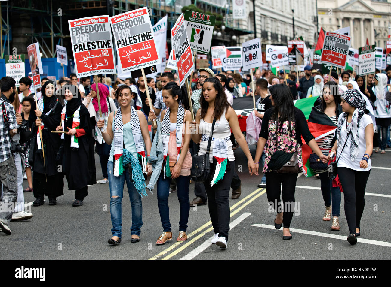 Participants march during a demonstration against the Israeli blockade ...