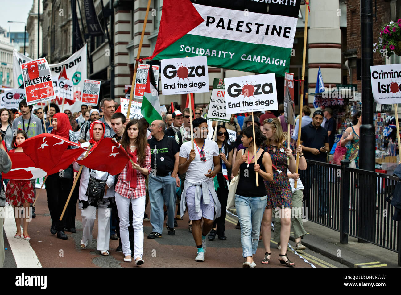 Participants march during a demonstration against the Israeli blockade ...