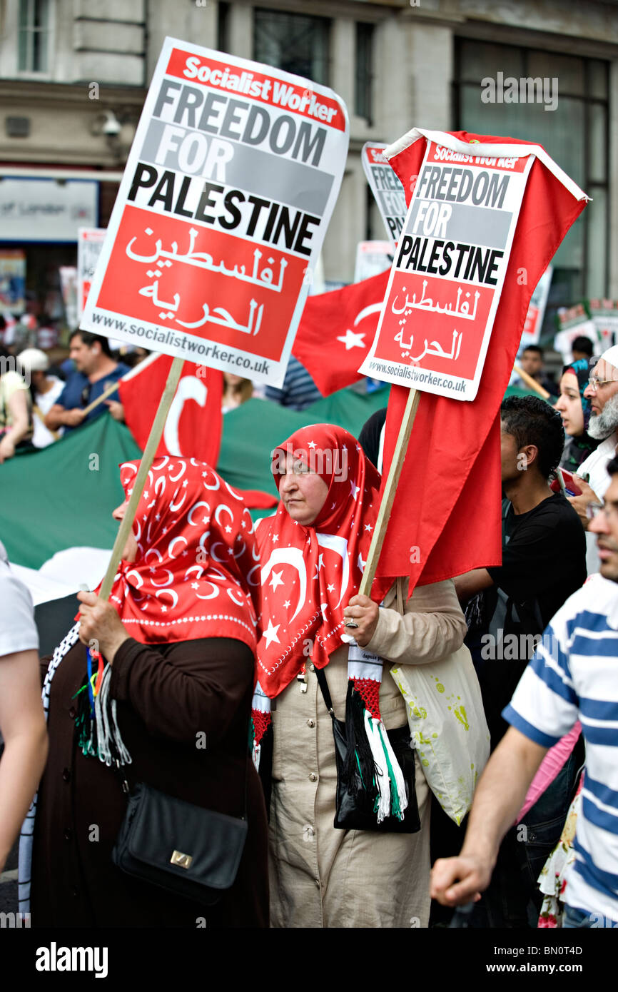 Two women march during a demonstration against the Israeli blockade of ...