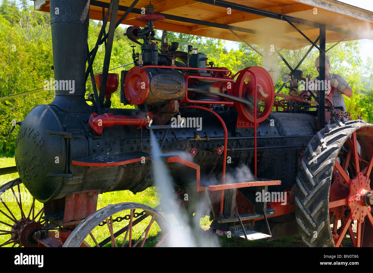 Man blowing the whistle on a Sawyer Massey steam engine tractor Lang ...