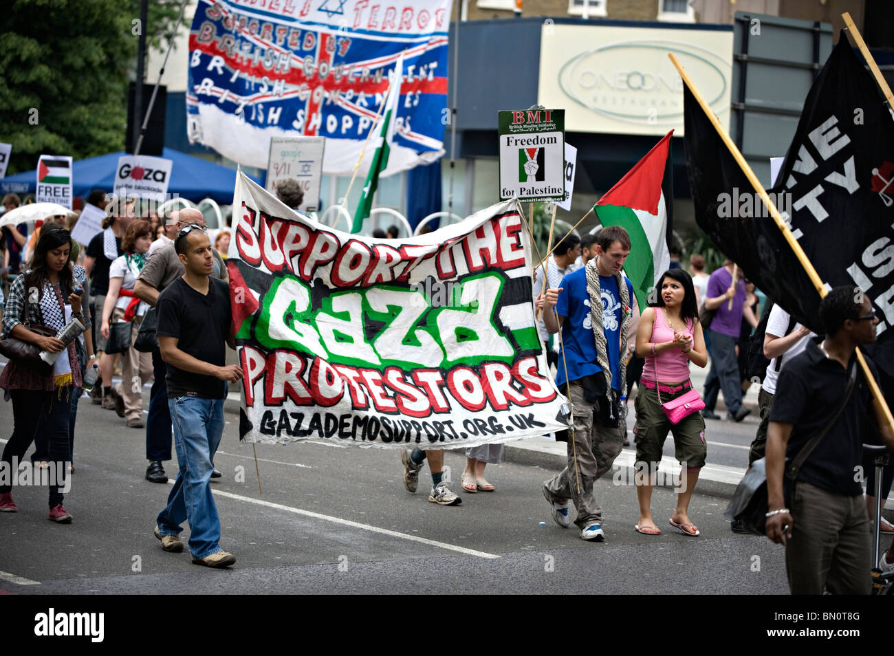 Participants march during a demonstration against the Israeli blockade ...