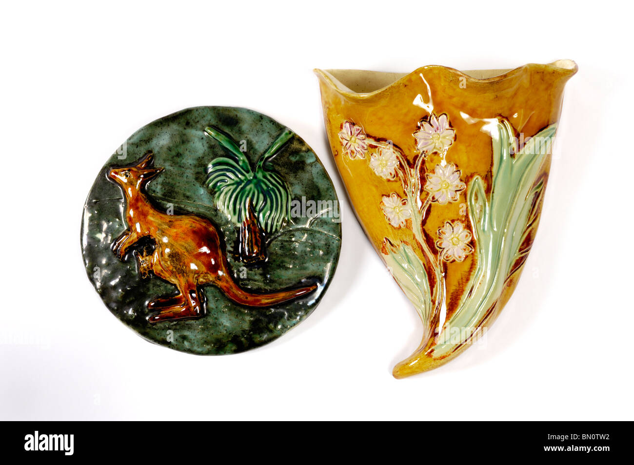 Two pieces of hand made amateur Australian pottery: a wall plaque ...