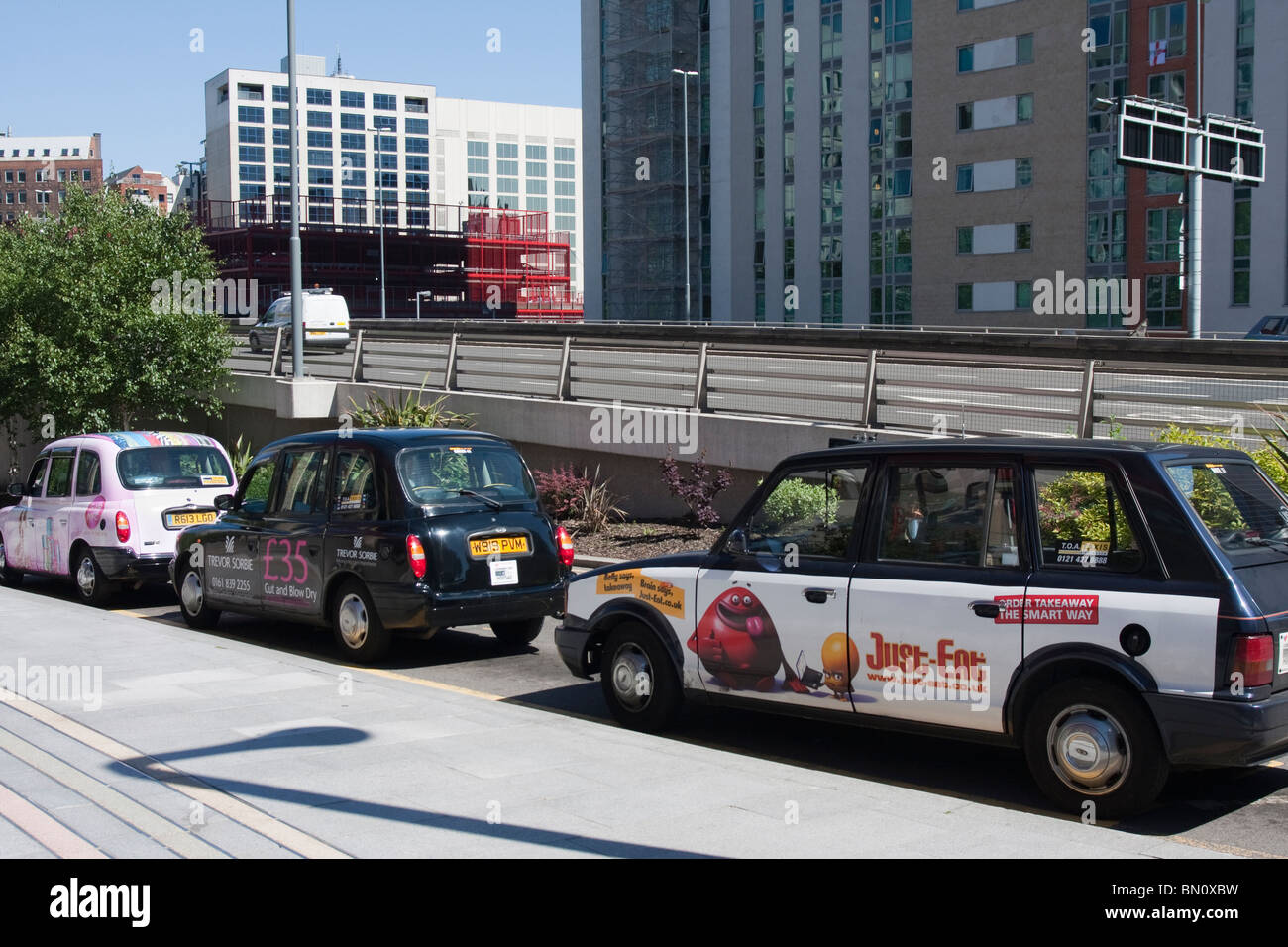 Taxis waiting in taxi rank hi-res stock photography and images - Alamy