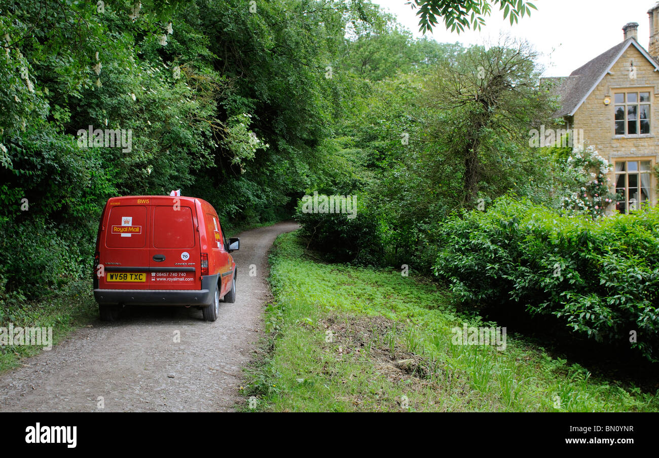 Royal Mail red post office van on a rural country lane Upper Slaughter ...